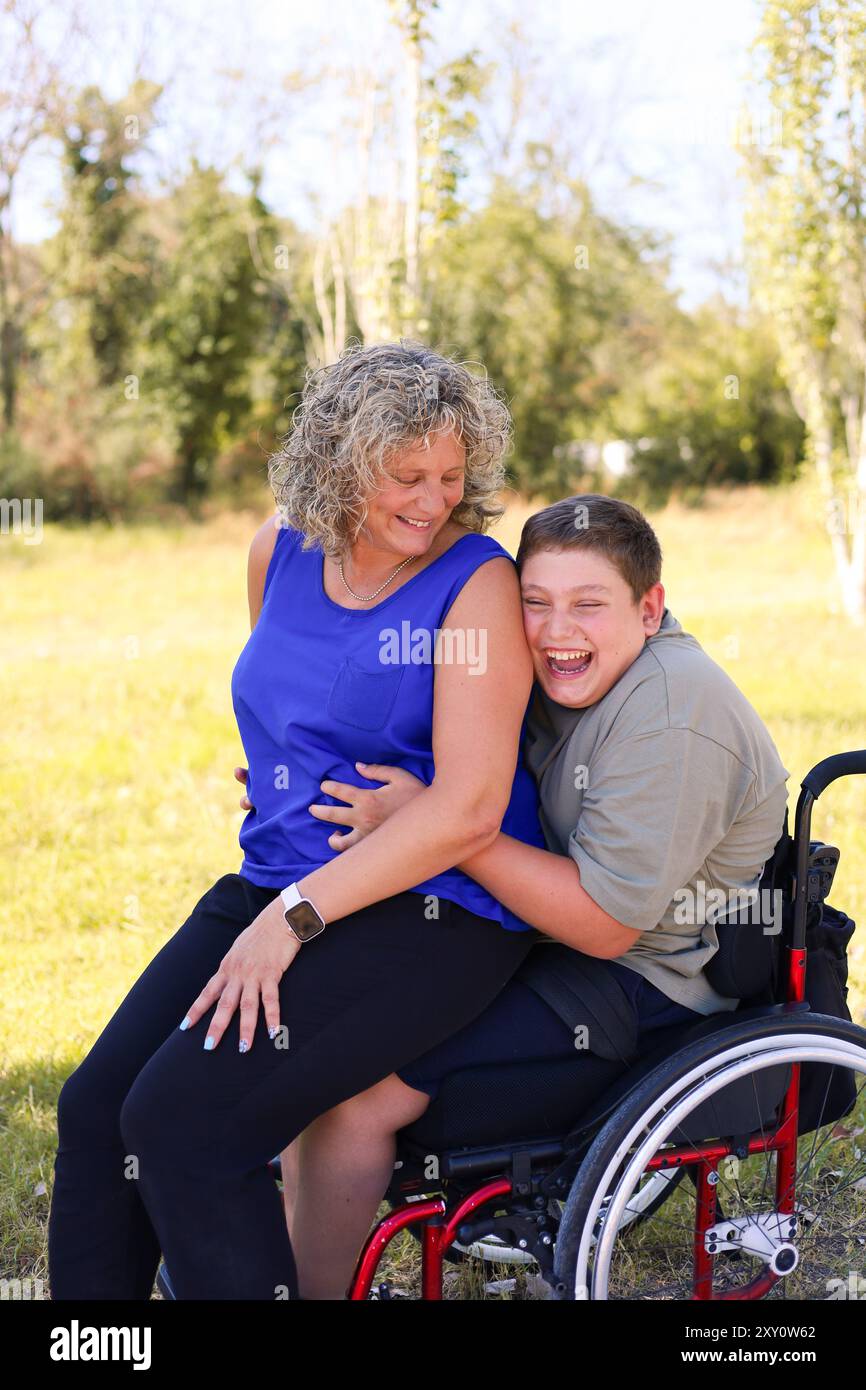 Family shares joyful hug hi-res stock photography and images - Alamy