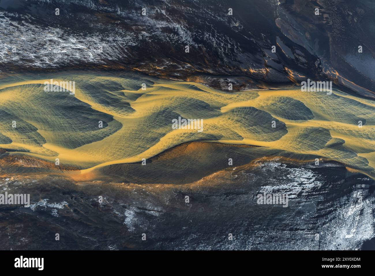 Top view, intricate braided patterns of Holtsos River in Iceland are ...
