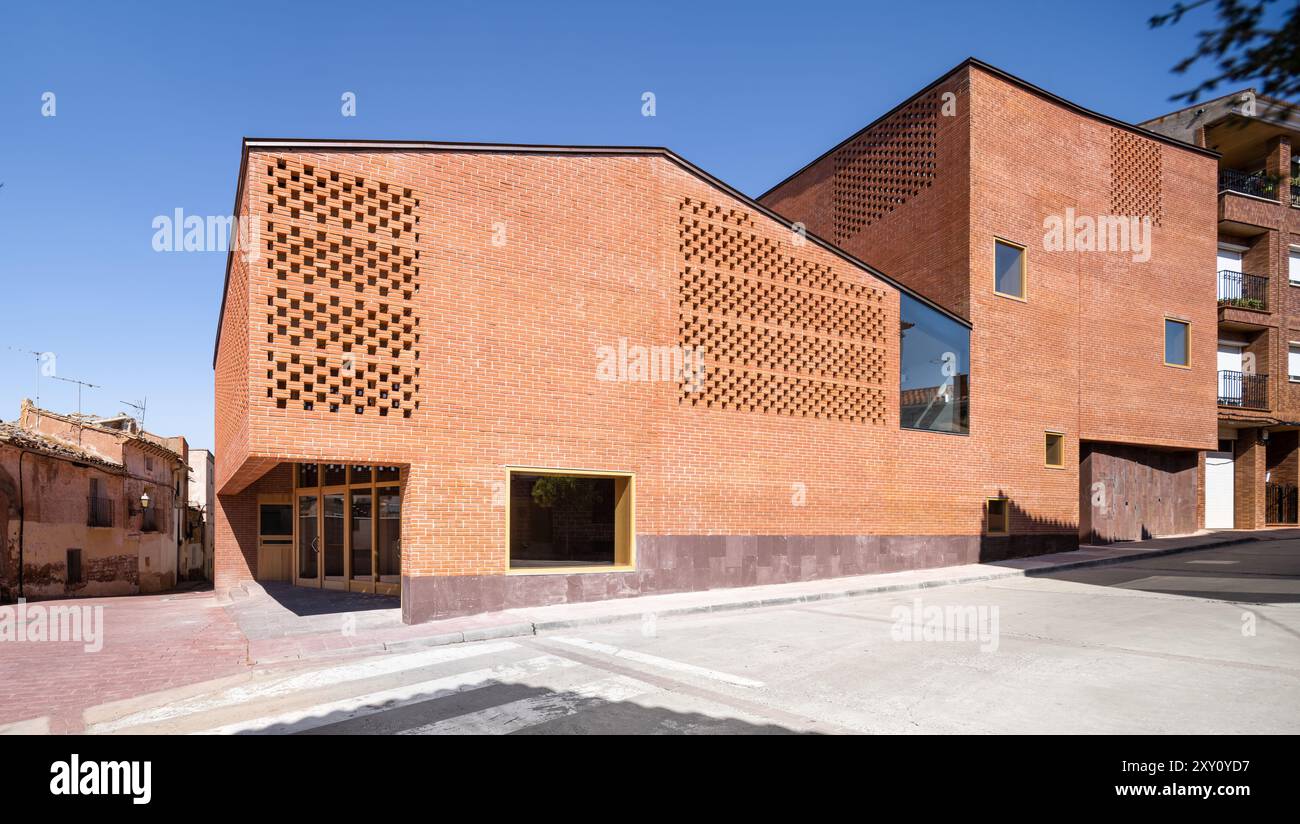 Exterior view of a contemporary auditorium building, boasting a unique ...