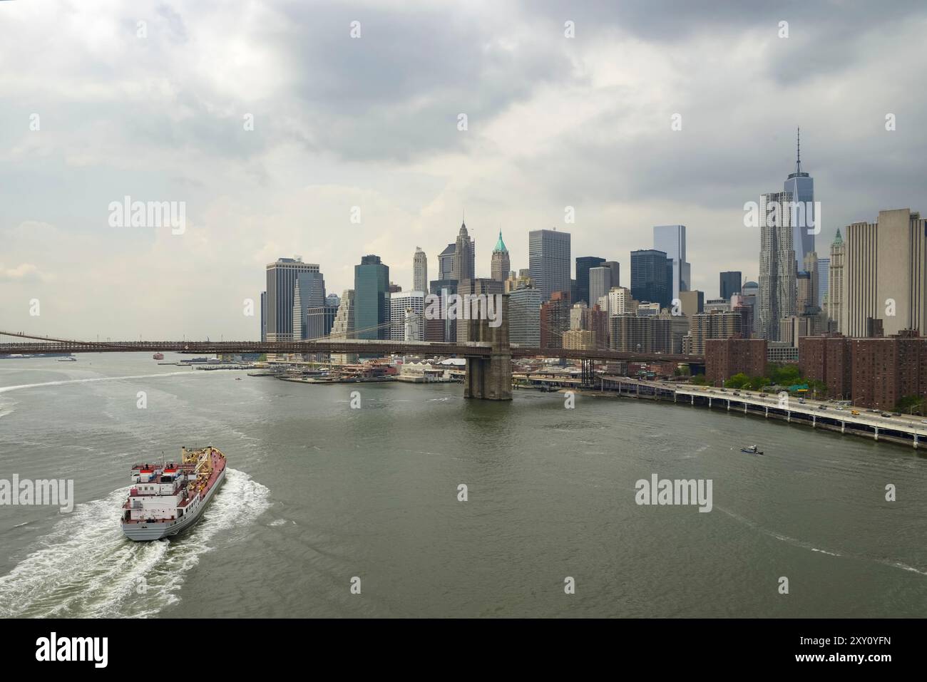 A scenic view of Manhattan’s iconic skyline featuring the towering skyscrapers and the Brooklyn ...