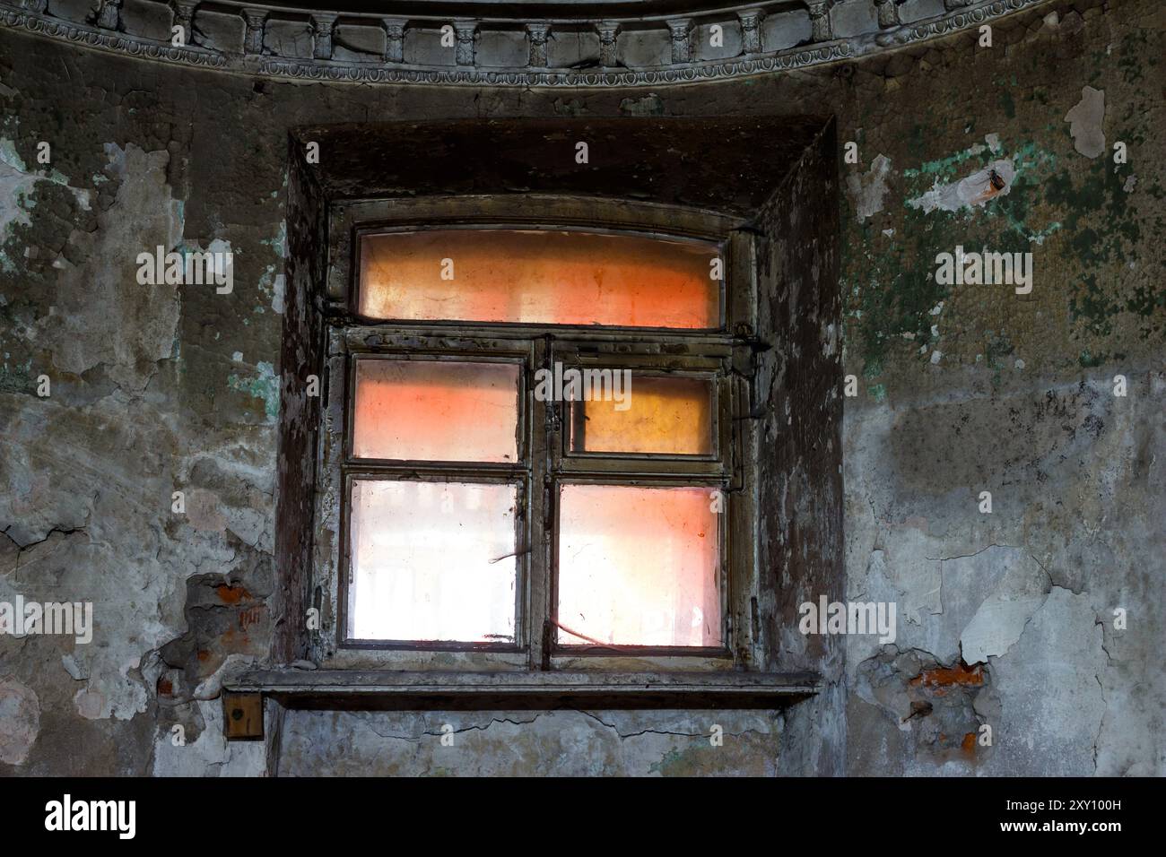 Dirty window in the basement barely letting in sunlight, abandoned ...