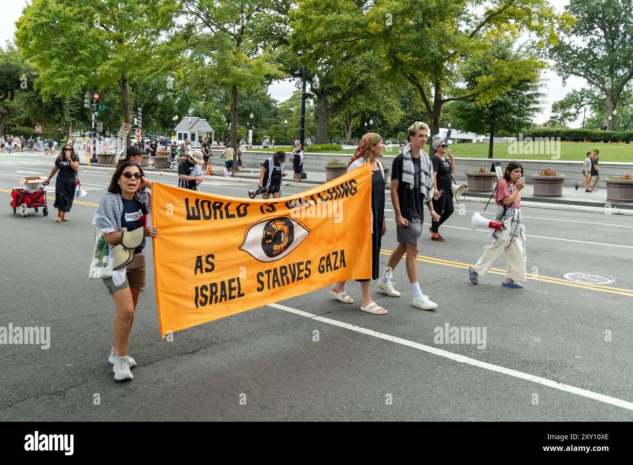 Washington DC, USA - 08/19/2024: A group of people are walking down the ...