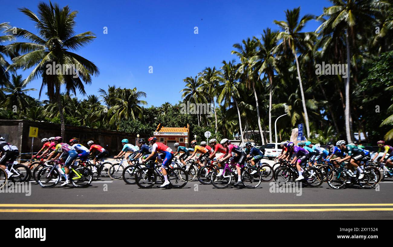 Qionghai, China's Hainan Province. 27th Aug, 2024. Cyclists compete ...