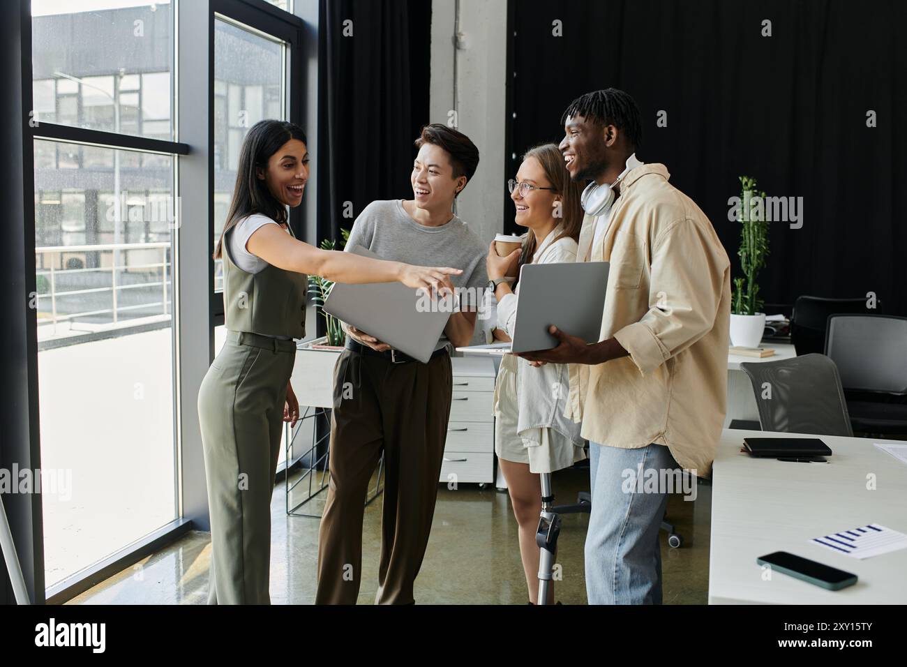 Four confident diverse colleagues office hi-res stock photography and ...