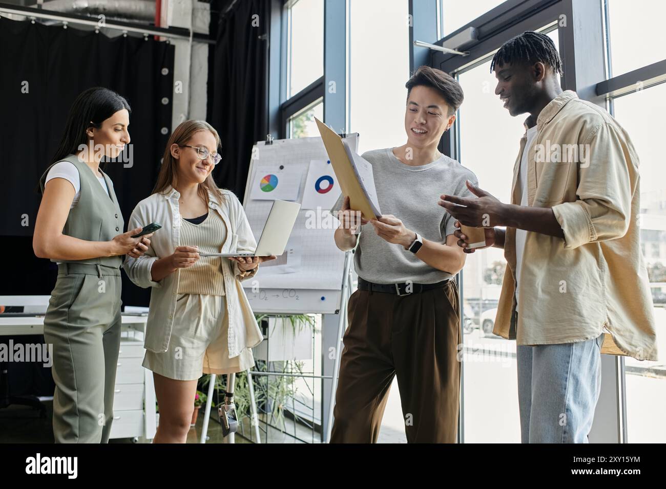 Business colleagues reviewing charts hi-res stock photography and ...