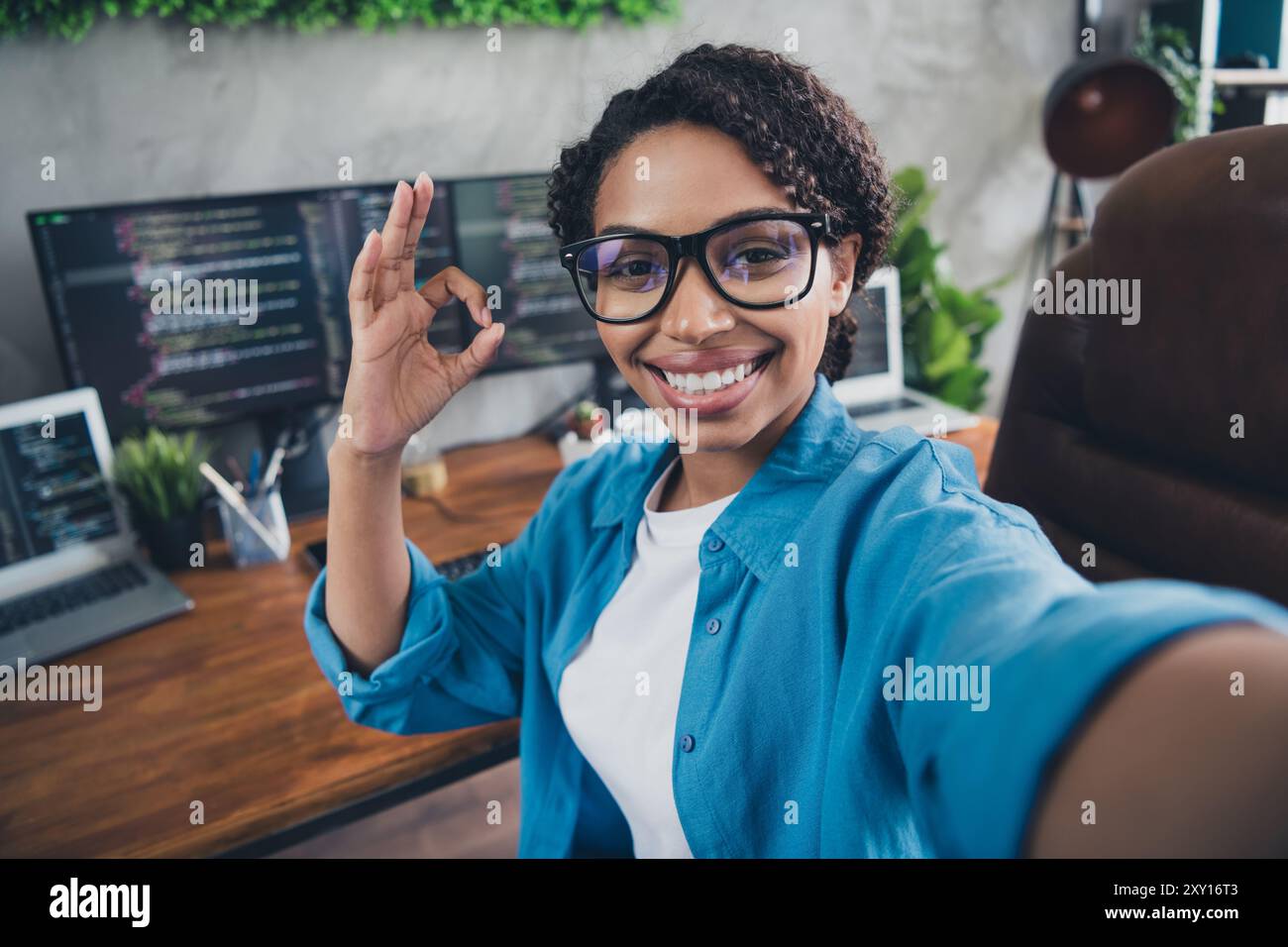 Photo of young woman show okey monitors coding selfie photo wear blue ...