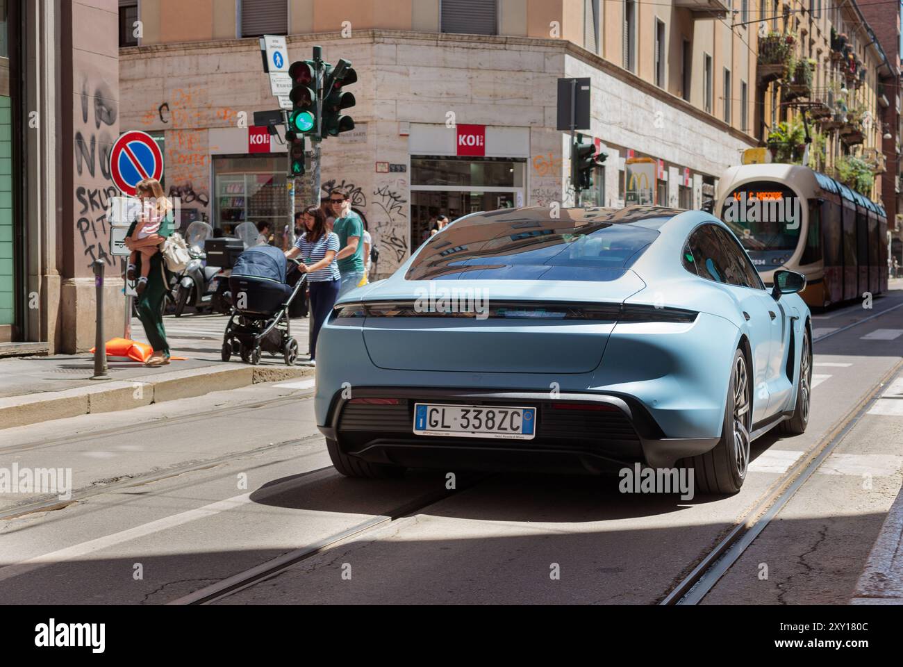 Milan, Italy- June 22, 2024: Neptun Blue Porsche Taycan 4S Sport Turism ...