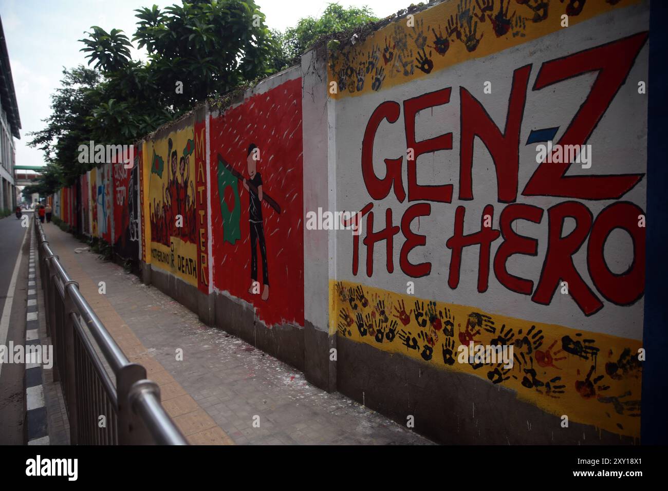 The graffitied walls at Agargaon Area are decorated with various ...