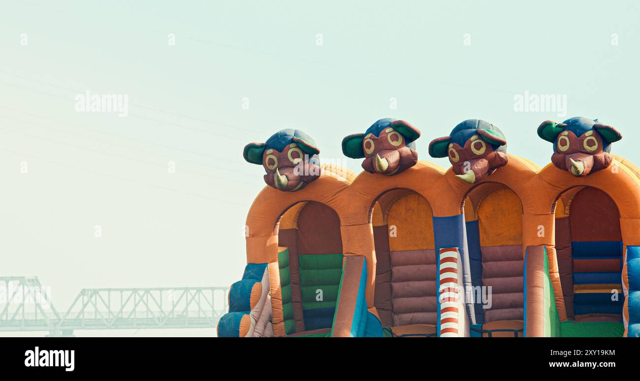 Varanasi, India. Inflatable Rides On Ganges Embankment. Family Fun And ...