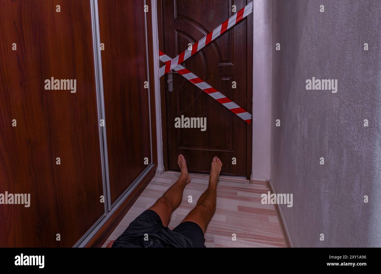 The entrance door to the apartment, police tape, secured the crime ...