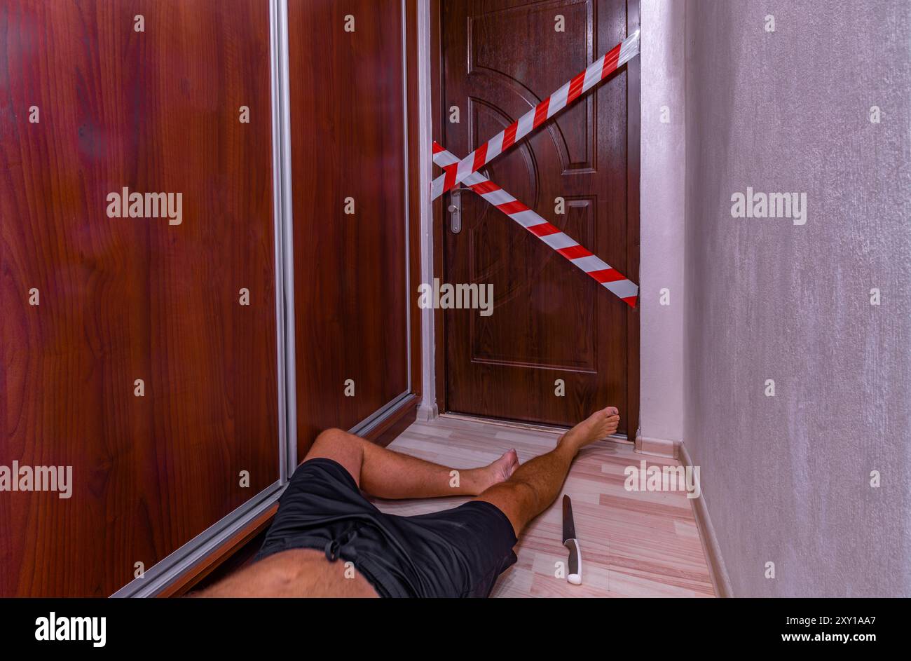 The entrance door to the apartment, police tape, secured the crime ...