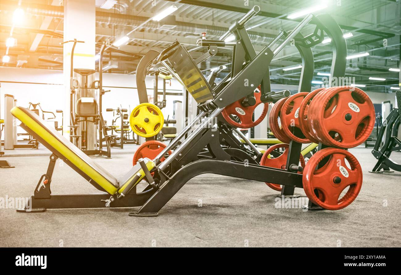 leg press machine with weight Stock Photo - Alamy