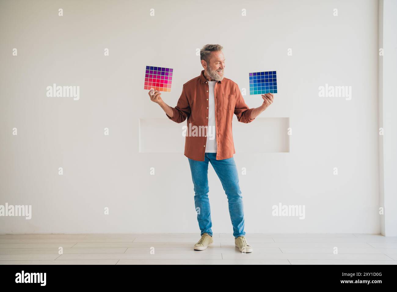 Full size photo of pensioner man compare color samples dressed brown ...
