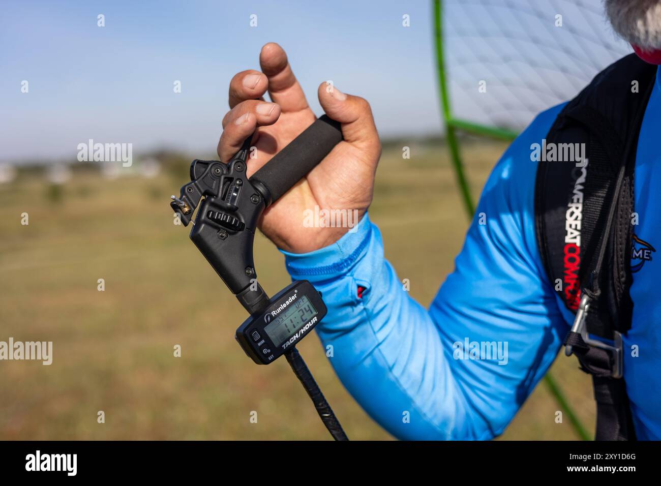 Pilot checking the paragliding equipment before flight Stock Photo - Alamy