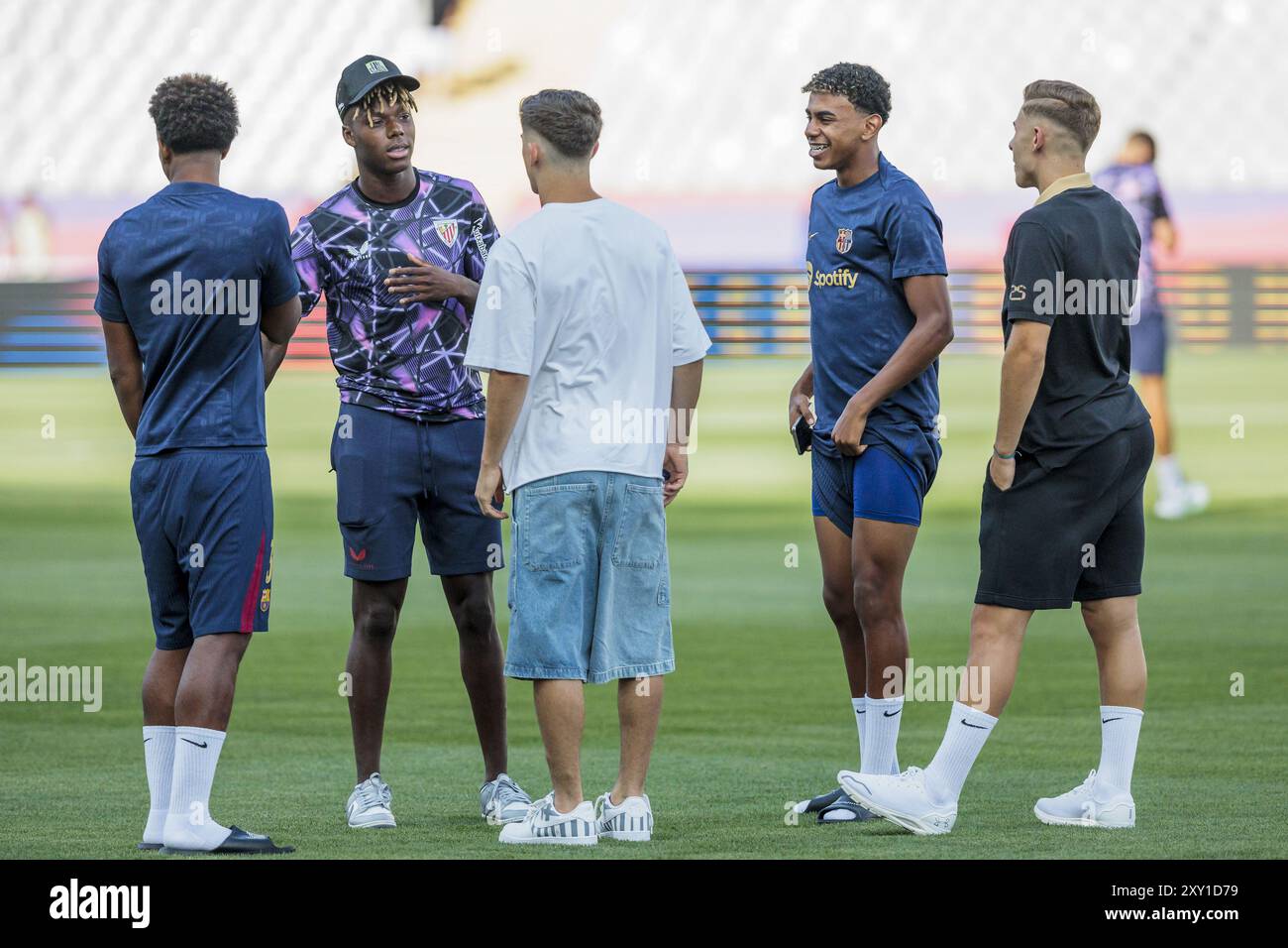 Nico Williams of Athletic Club de Bilbao talks with Lamine Yamal, Fermin Lopez, Pablo Martin ...
