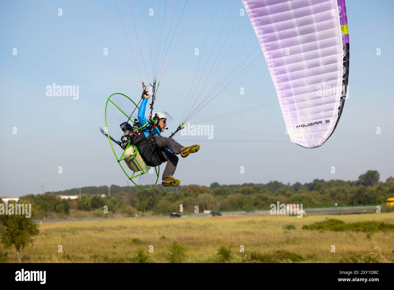 Powered paragliding flight Stock Photo - Alamy