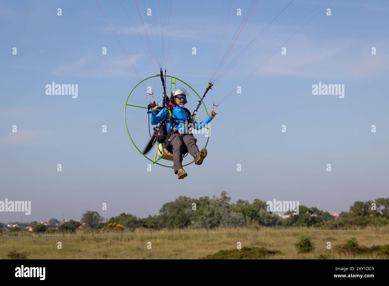 Powered paragliding flight Stock Photo - Alamy