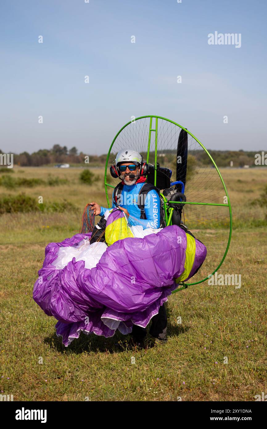 Pilot of powered paragliding with wing Stock Photo - Alamy