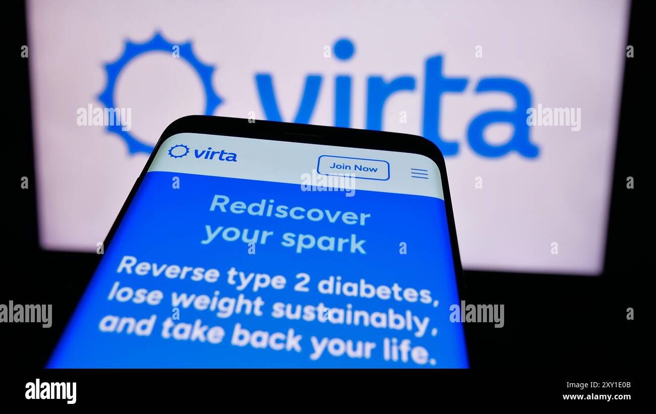 Smartphone with website of US diabetes treatment company Virta Health ...