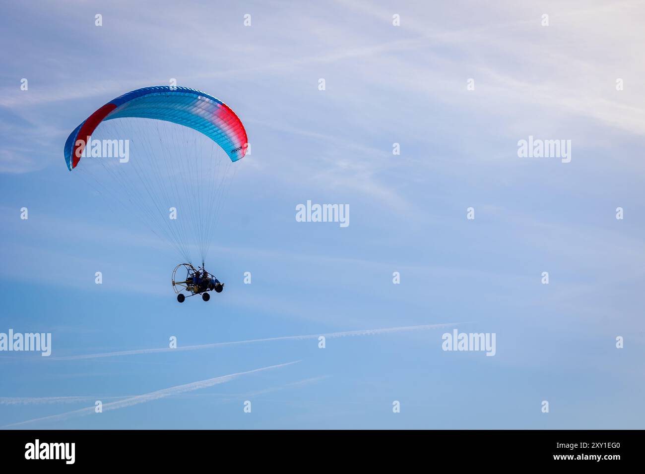 Powered paragliding flying Stock Photo - Alamy