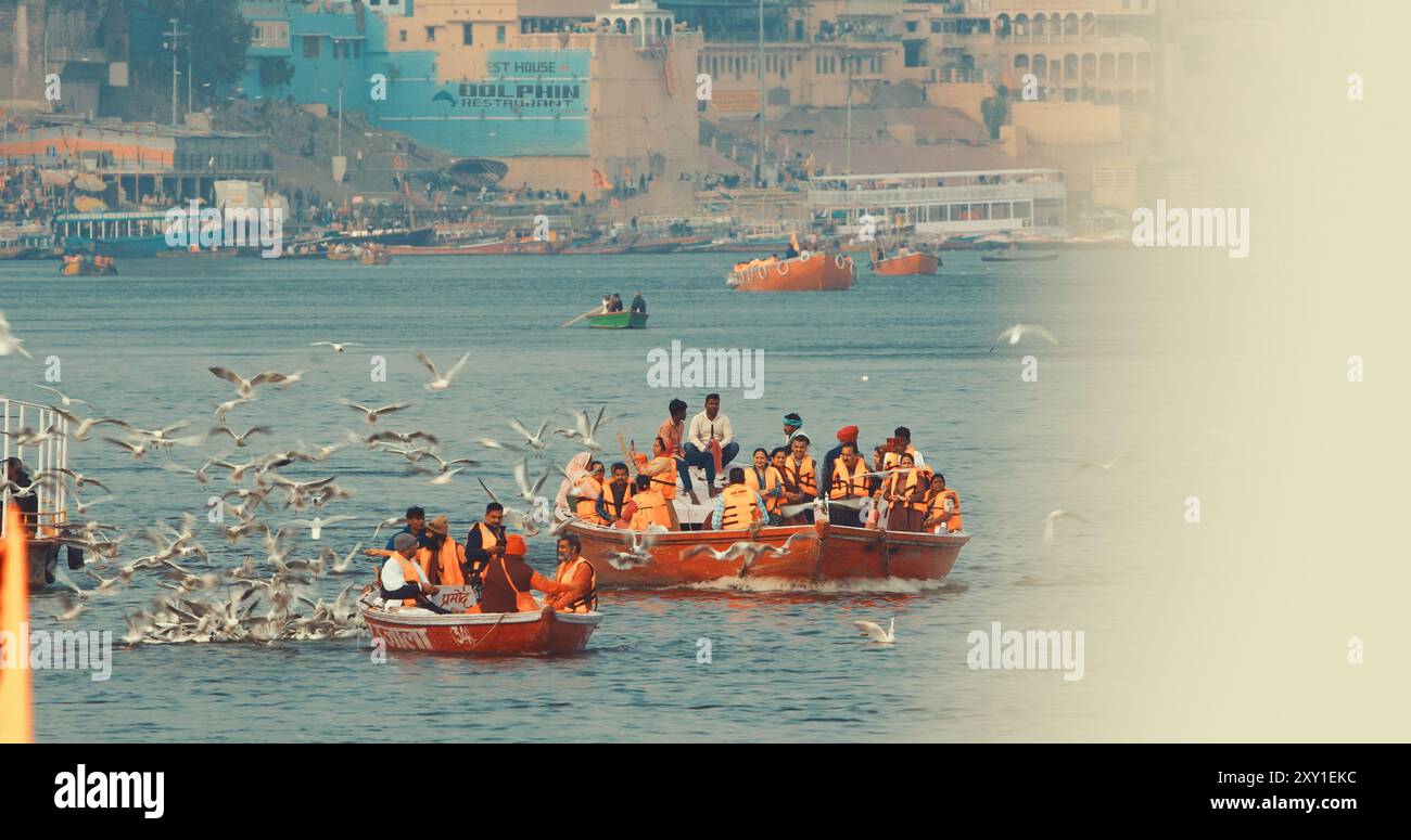 Varanasi, India. Tourists And Indian Pilgrims Floating On Ganga ...