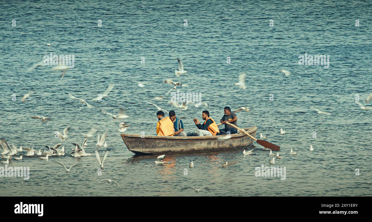 Varanasi, India. Tourists And Indian Pilgrims Floating On Ganga ...