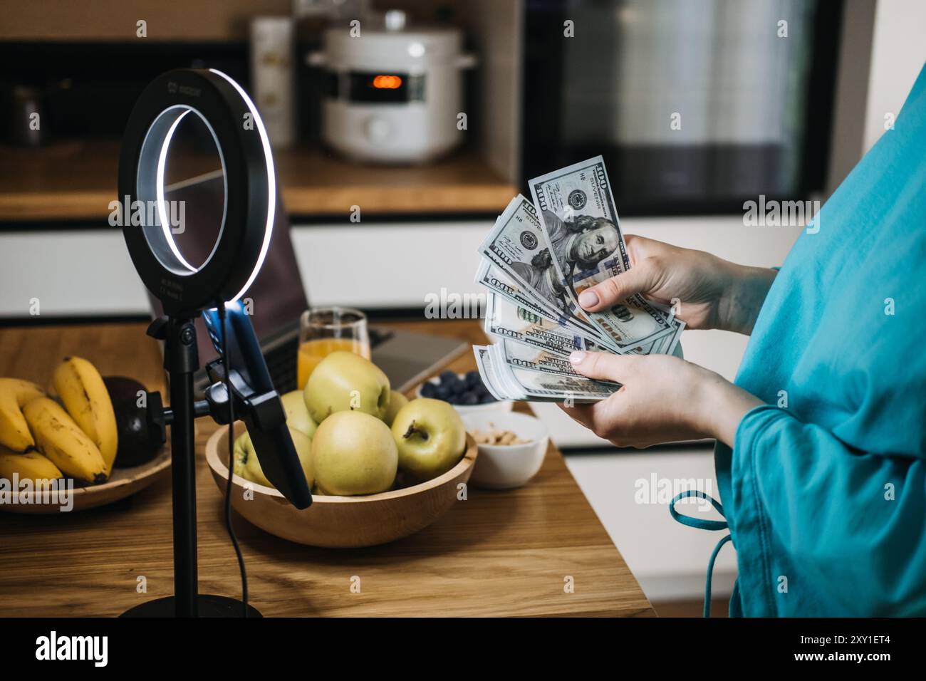 Content creator counting money during live stream, influencer marketing ...