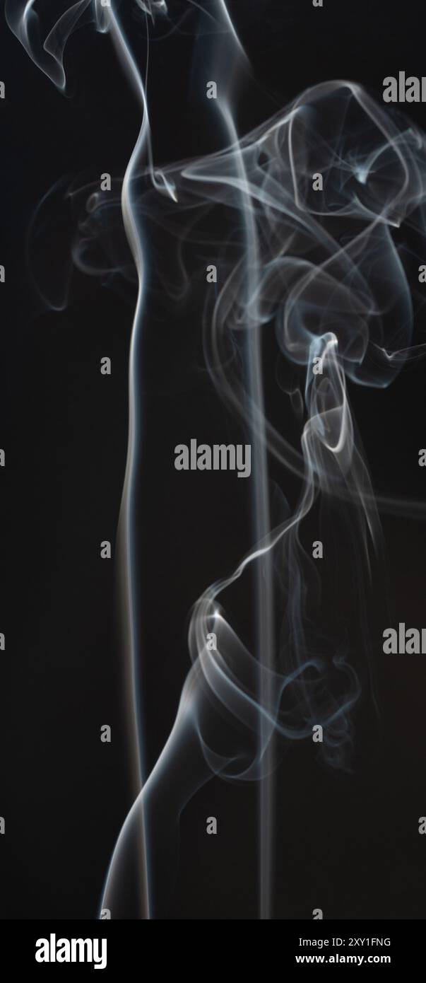 Mystic flow smoke lines isolated on black studio background Stock Photo ...