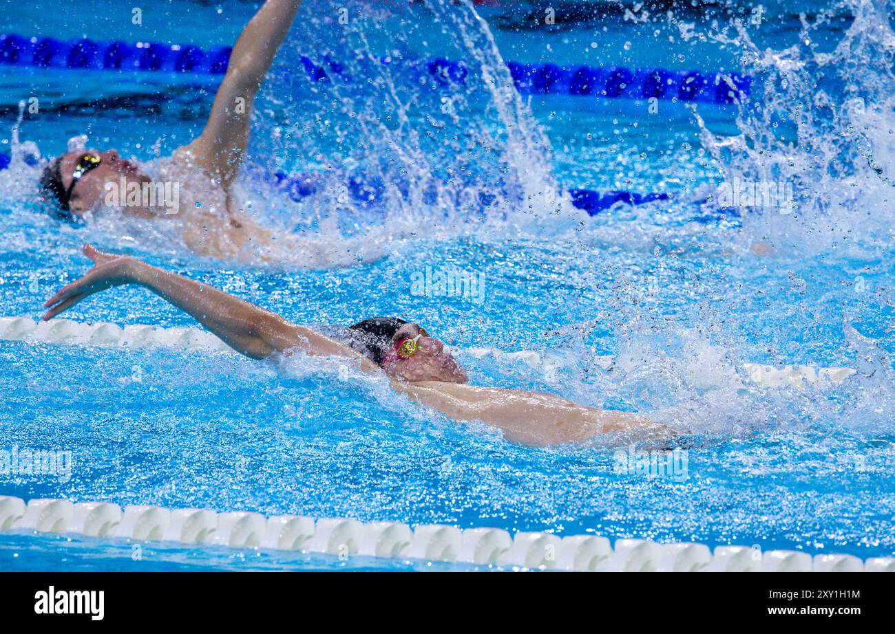 27 August 2024, France, Paris: Backstroke swimmers train in the ...
