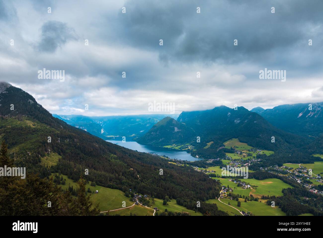 Alps mountain lake Grundlsee with village in valley at overcast weather ...