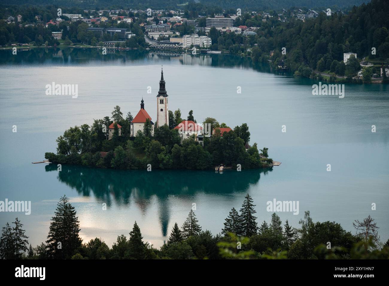Church of the Mother of God with castle and mountains in background ...