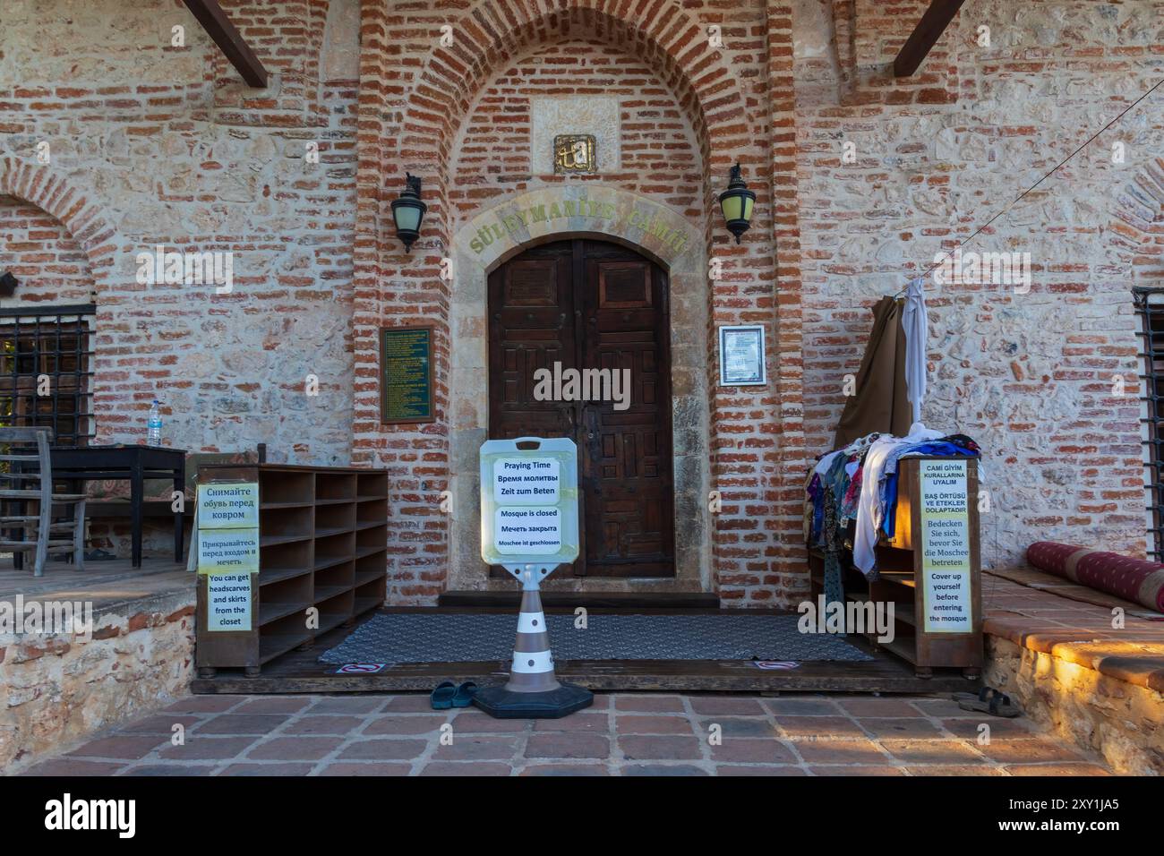 Alanya, Turkey – August 24, 2024: Mosque entrance door with praying ...