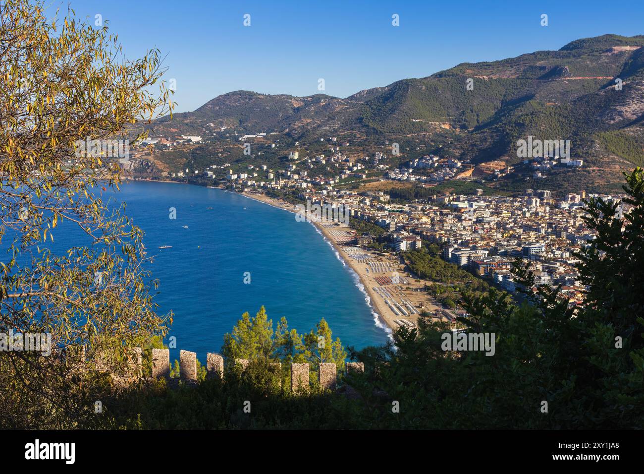 Aerial view to beach with city Alanya and mountain, vacation background ...