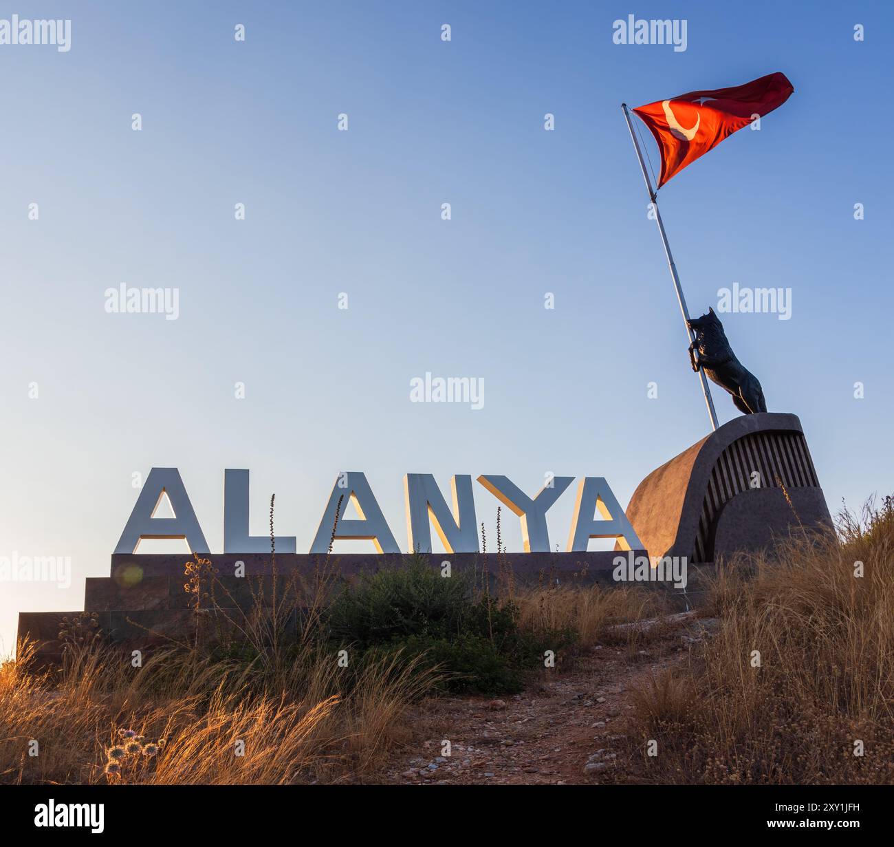 Alanya welcome sign text with wolf sculpture and turkey flag Stock ...