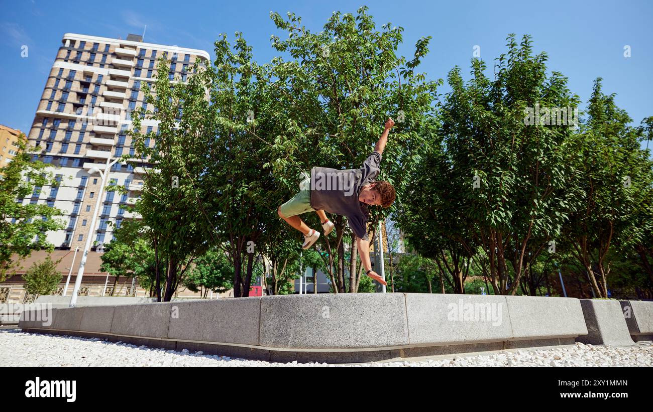 Professional parkour athlete performing dynamic hi-res stock ...