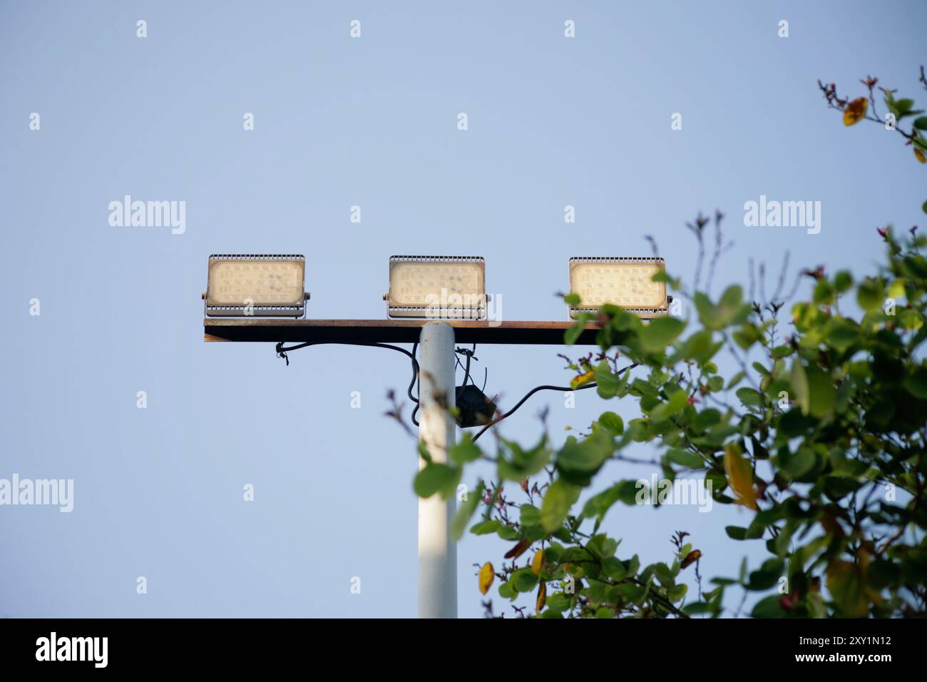 LED street lamp on blue sky background Stock Photo - Alamy