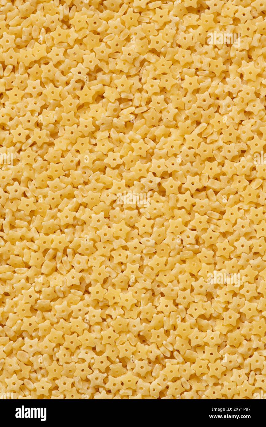 Pasta stelline texture. Dry uncooked italian pasta stelline natural ...