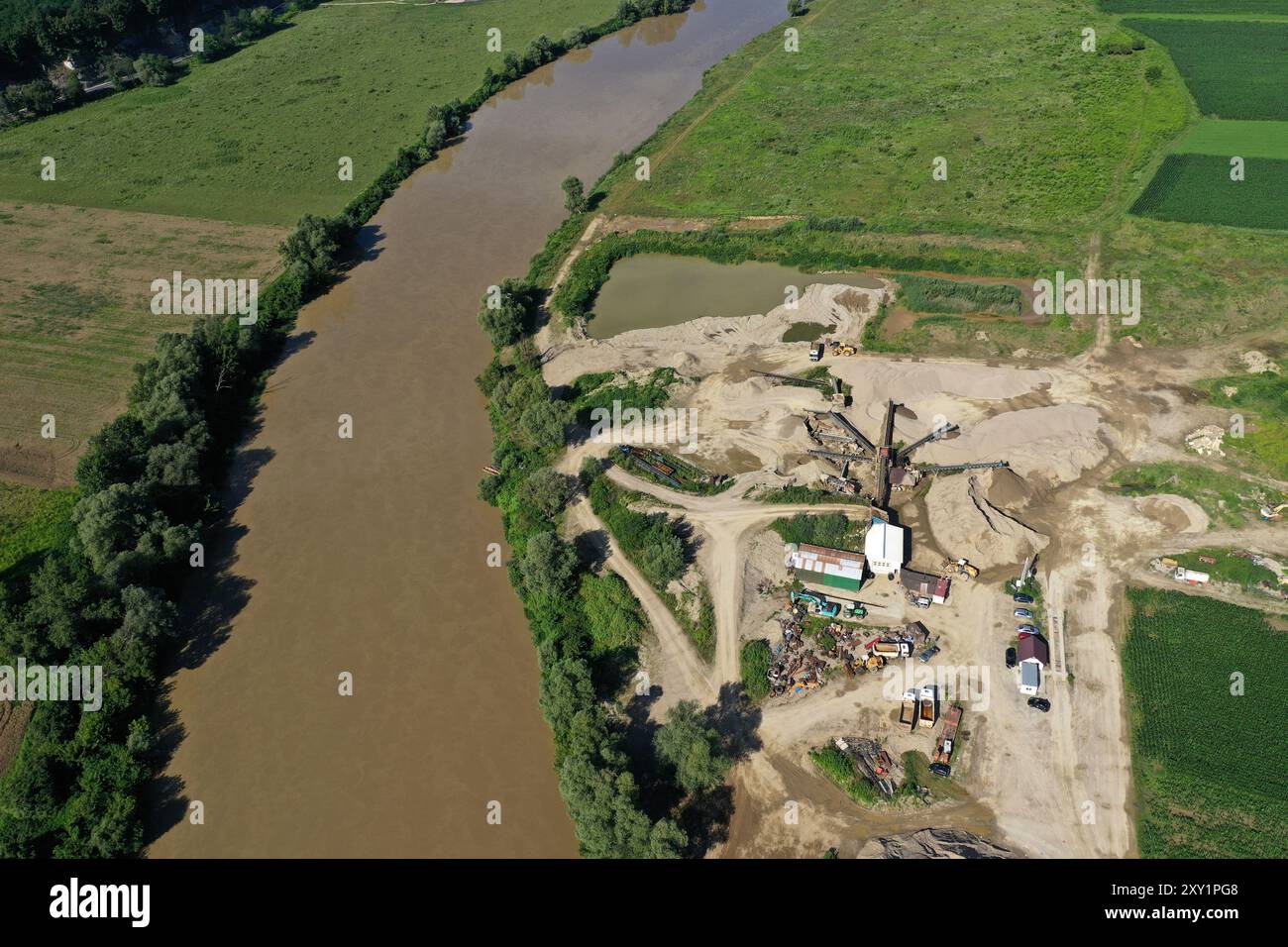 Aerial view of river sand and gravel exploitation, pit, quarry, ballast ...
