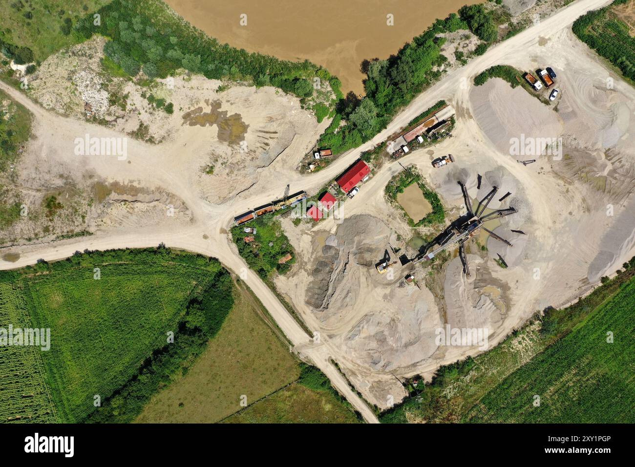 Aerial view of river sand and gravel exploitation, pit, quarry, ballast ...