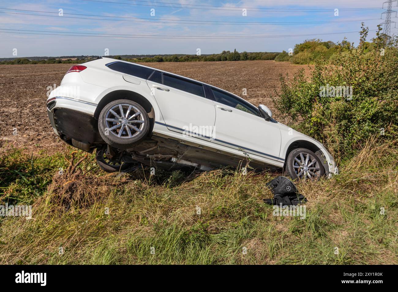 A car crash in a dike on Romney Marsh, Kent Stock Photo - Alamy