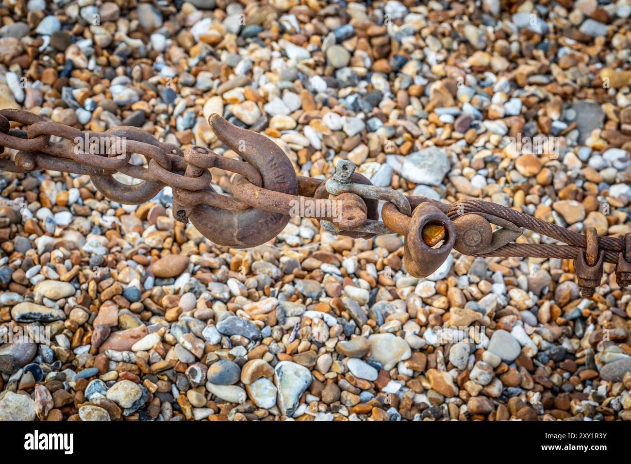 A rusty metal tow hook with chains and wire rope Stock Photo - Alamy