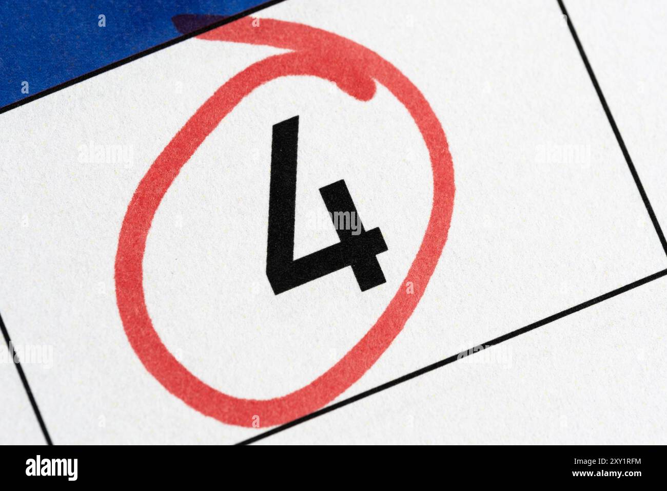 Fourth number in calendar is circled with red marker Stock Photo - Alamy