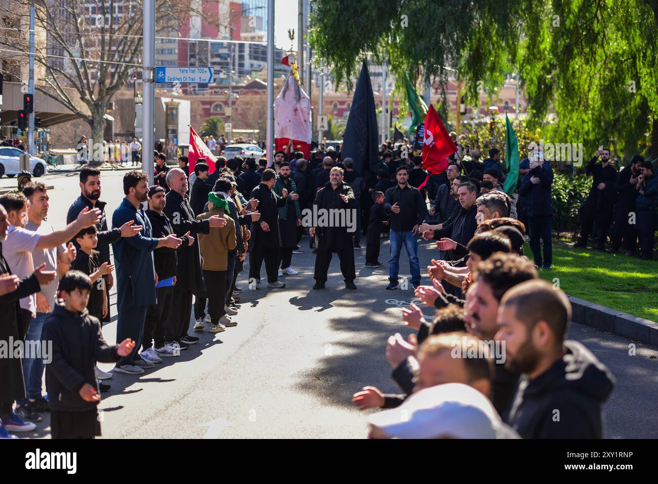 Melbourne, Australia. 25th Aug, 2024. Shia men are seen beating ...