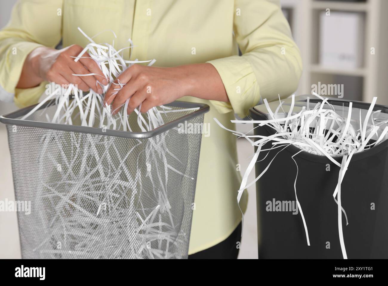 Woman putting trash garbage hi-res stock photography and images - Alamy