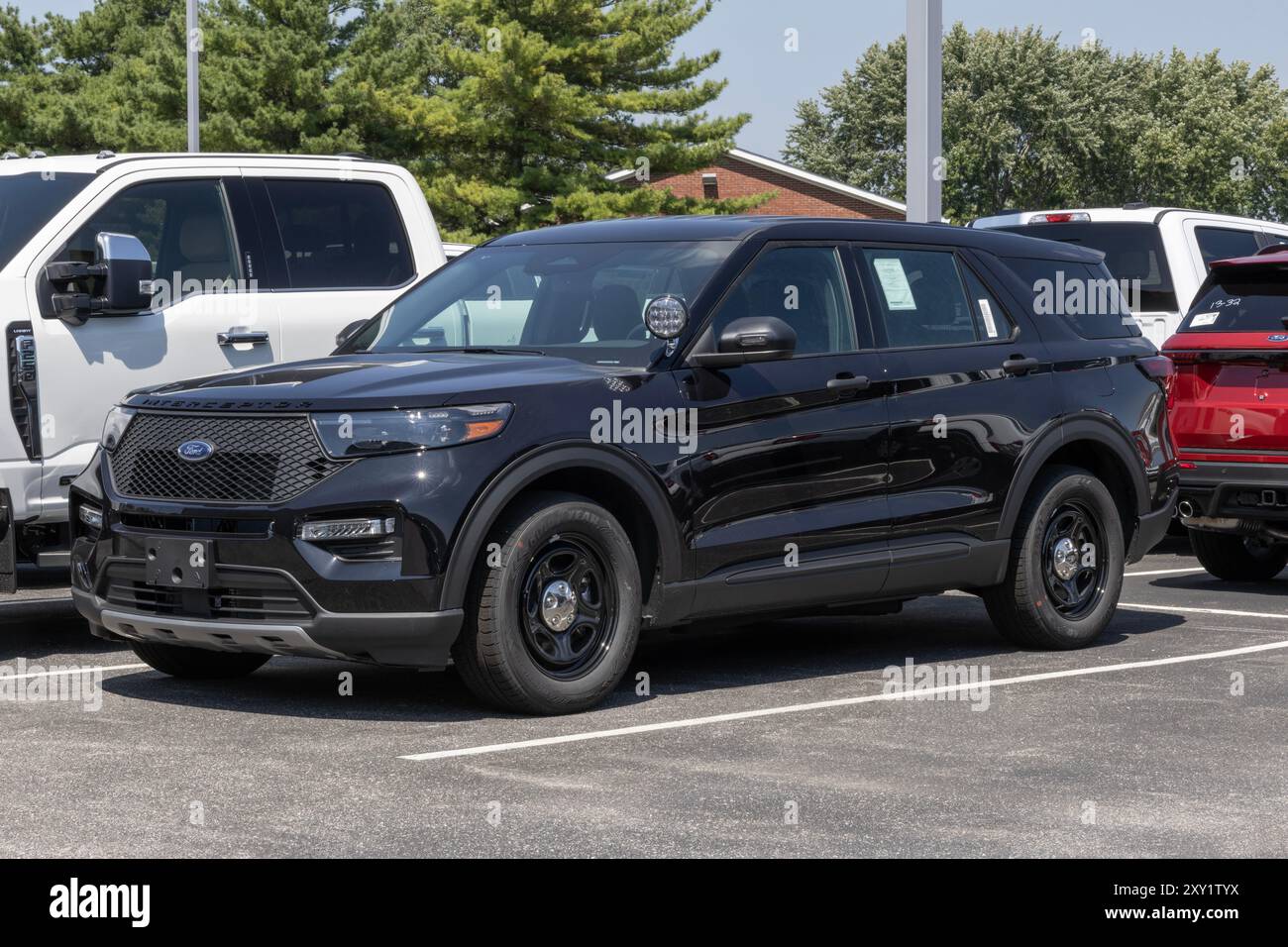 Kokomo - August 25, 2024: Ford Police Interceptor display at a dealership. Ford offers the ...