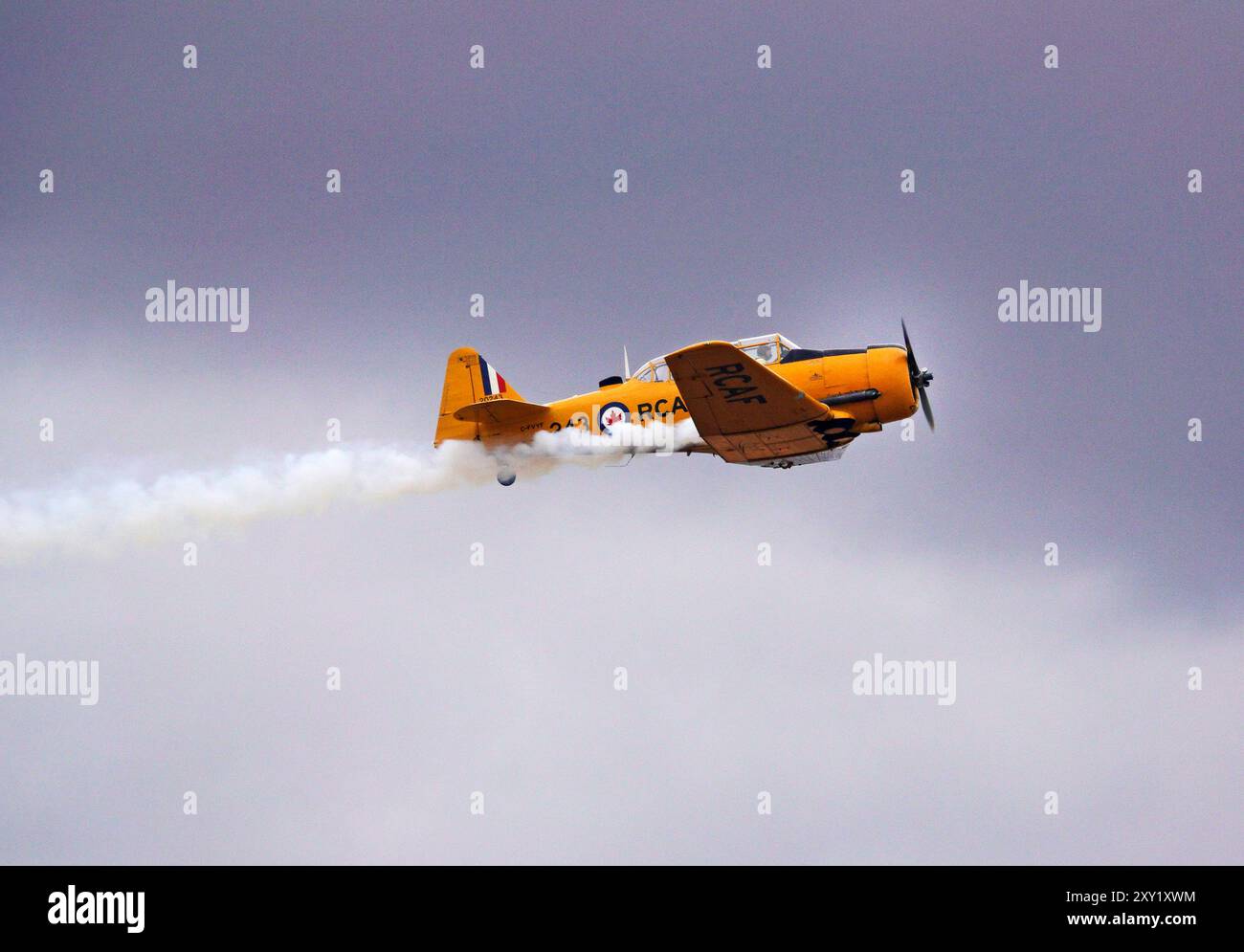 North American Harvard IV trainer aircraft flying at an annual airshow ...