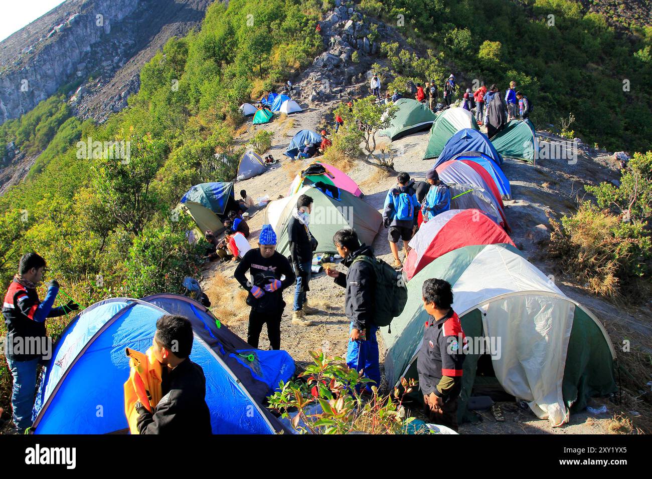 Climbers set up tents along the climbing route to the top of Mount ...