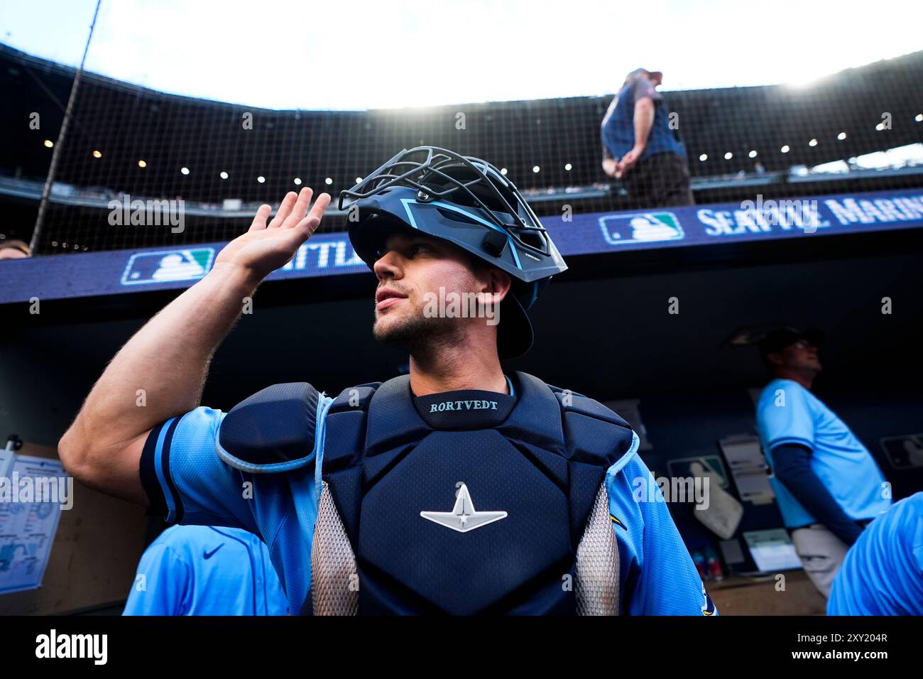 Tampa Bay Rays catcher Ben Rortvedt high-fives teammates and media ...