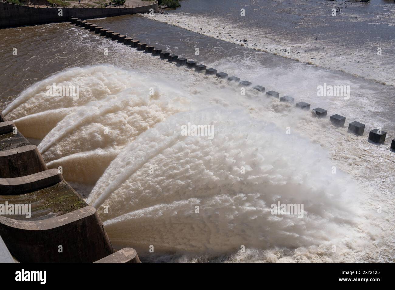Plumes of water jet from the spillway of the Rio Hondo Dam at Termas de ...