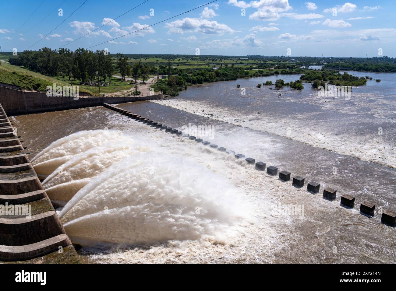 Plumes of water jet from the spillway of the Rio Hondo Dam at Termas de ...